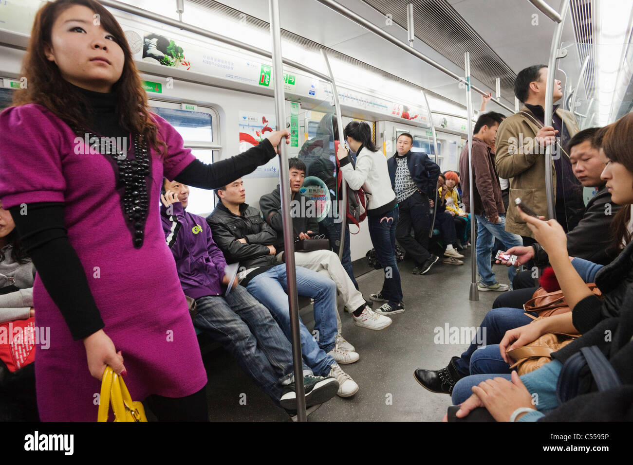 Passengers in a subway train, Beijing, China Stock Photo - Alamy