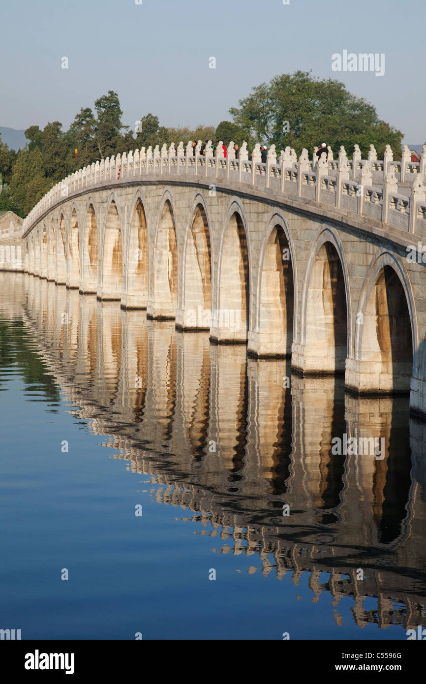 Arch bridge across a lake, Seventeen-Arch Bridge, Kunming Lake, Summer ...