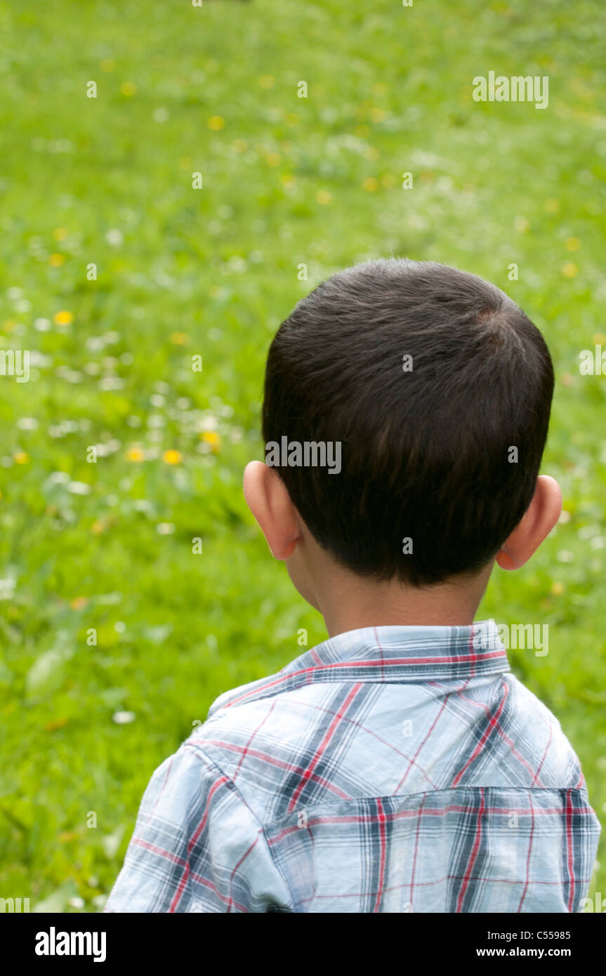 Rear view of a middle eastern boy looking away Stock Photo - Alamy