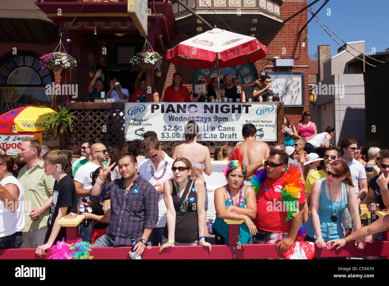 Spectators outside a bar at the Chicago Pride Parade, 2011 Stock Photo ...