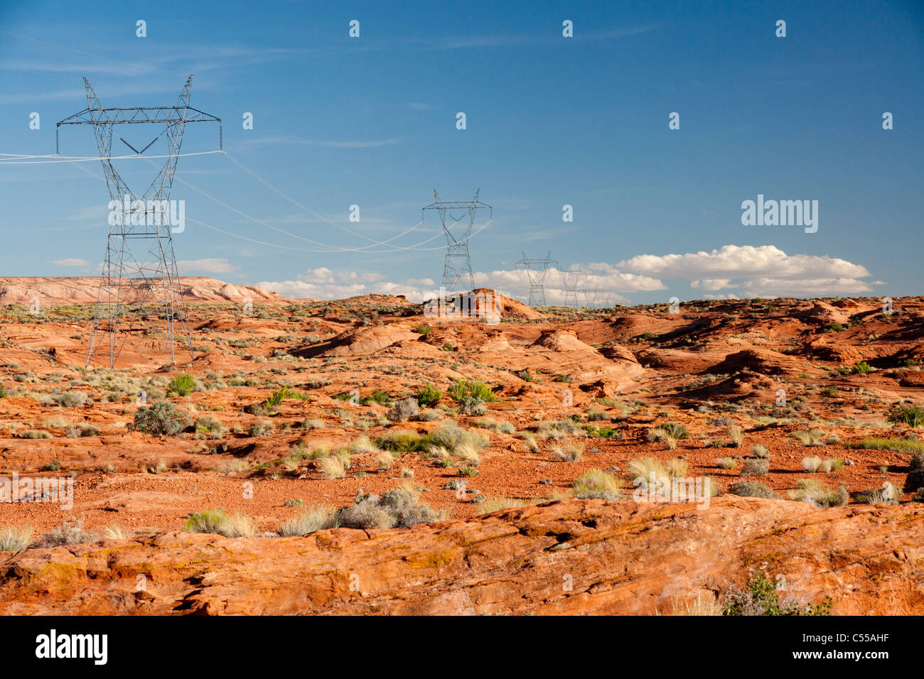 USA, Arizona, Vermillion Cliffs, Electricity pylons in desert Stock ...