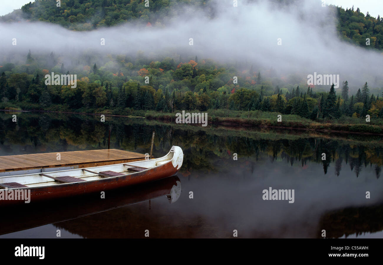 Boat moored at a pier, Jacques-Cartier River, Jacques-Cartier ...