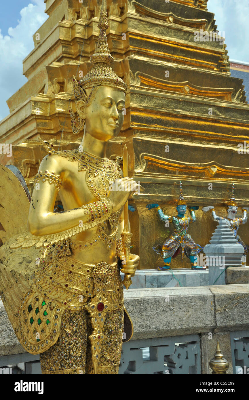 Statue at a temple, Wat Phra Kaeo, Grand Palace, Bangkok, Thailand ...