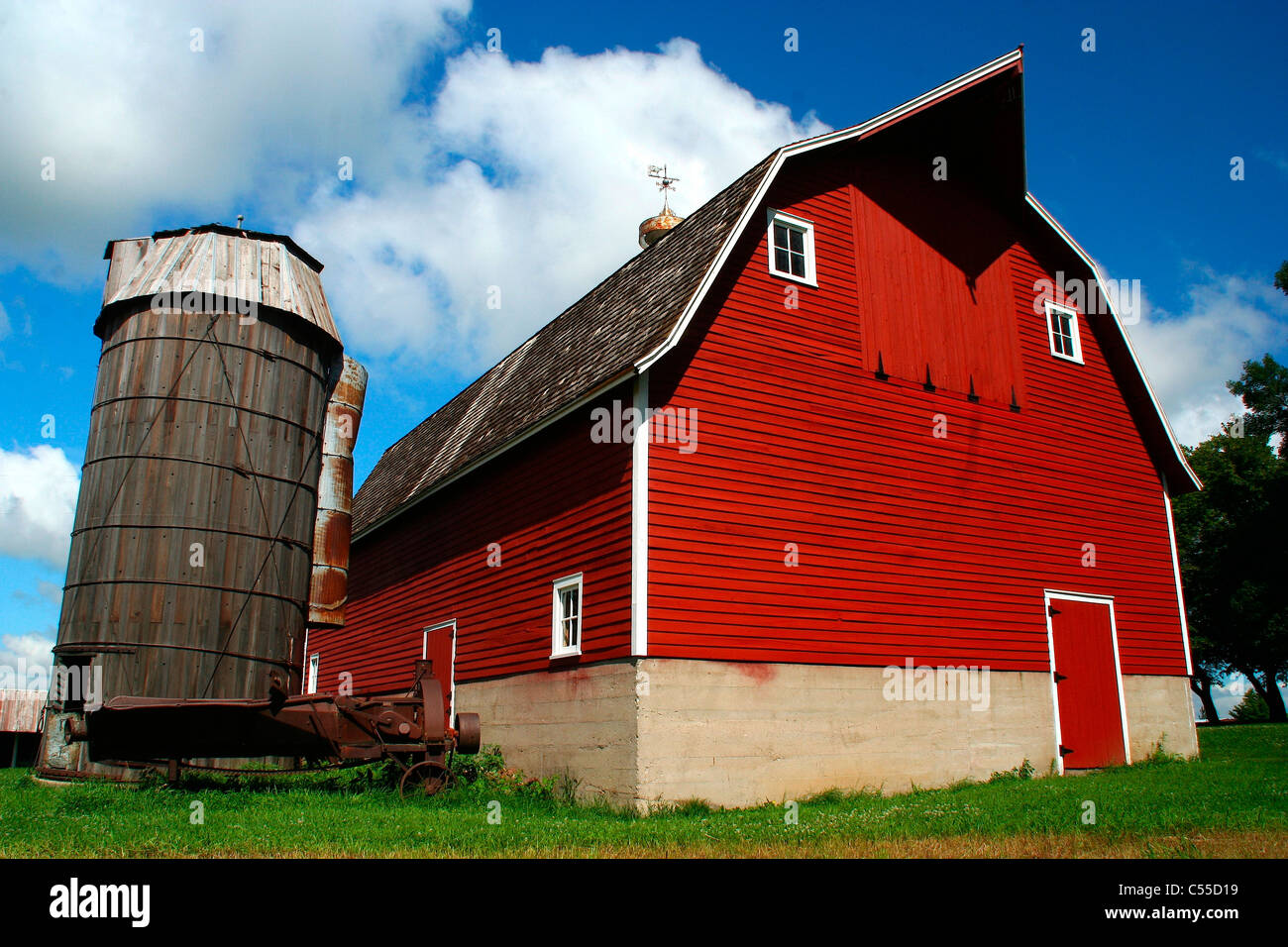 Red barn and silo in a field, Minnesota, USA Stock Photo - Alamy