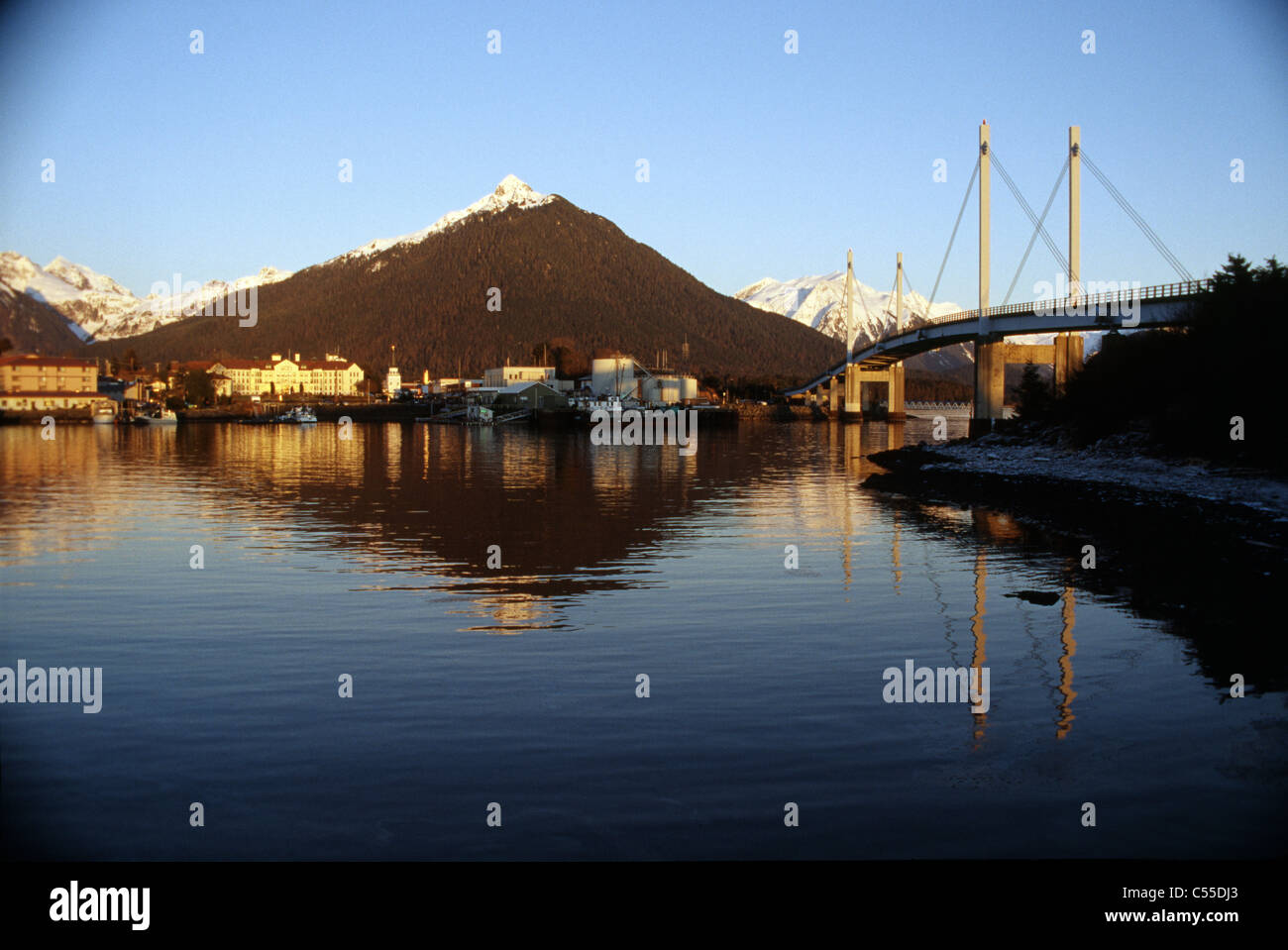 USA, Alaska, Sitka, Bridge with snowcapped mountains Stock Photo - Alamy