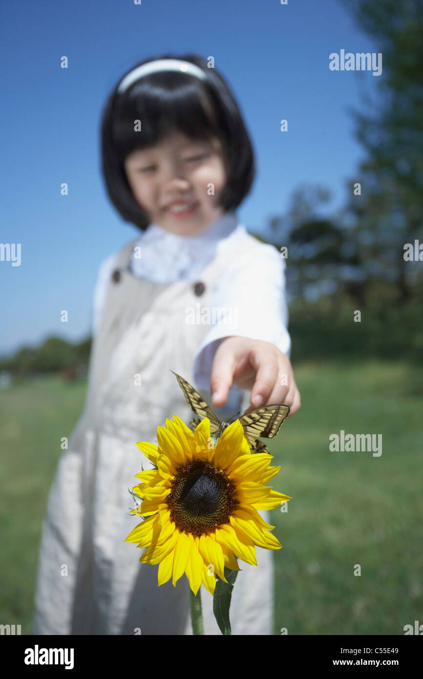 Child pointing butterfly hi-res stock photography and images - Alamy