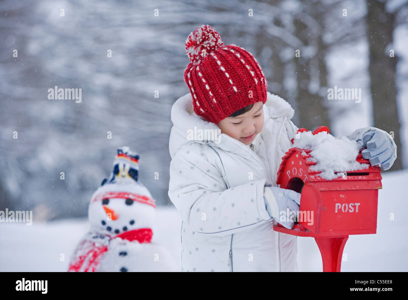 A child with a red mailbox Stock Photo - Alamy
