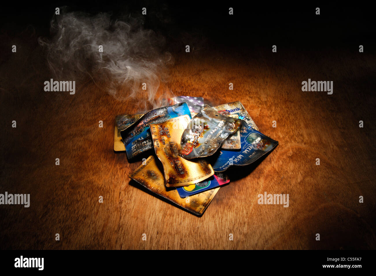 Stack of burnt credit cards Stock Photo - Alamy