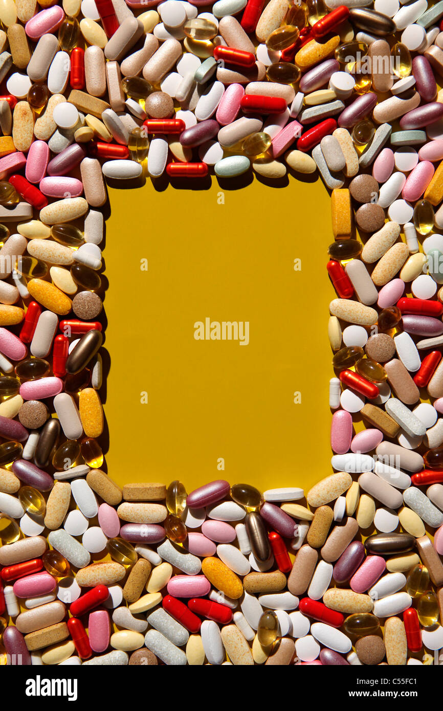 Rectangular shape in colorful multi-vitamin pills, tablets and capsules ...