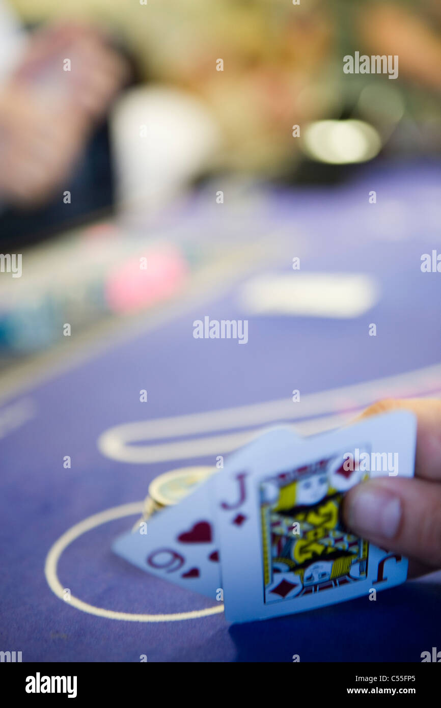 Close-up on dealt cards Stock Photo - Alamy