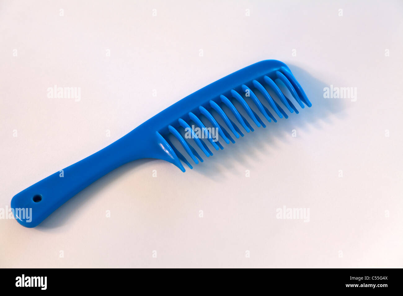 Close-up of a plastic comb Stock Photo - Alamy