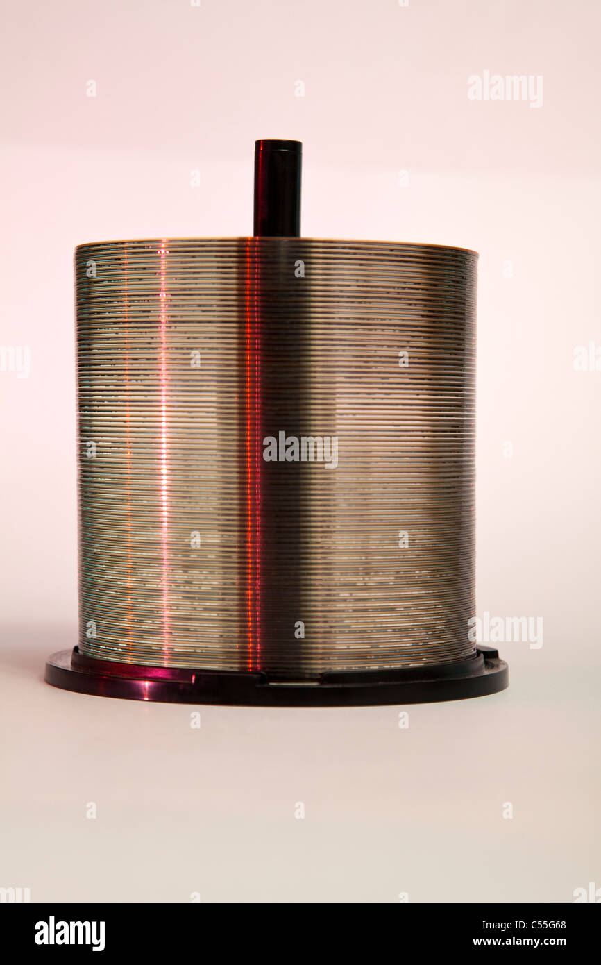 Stack of CD's on a spool Stock Photo - Alamy