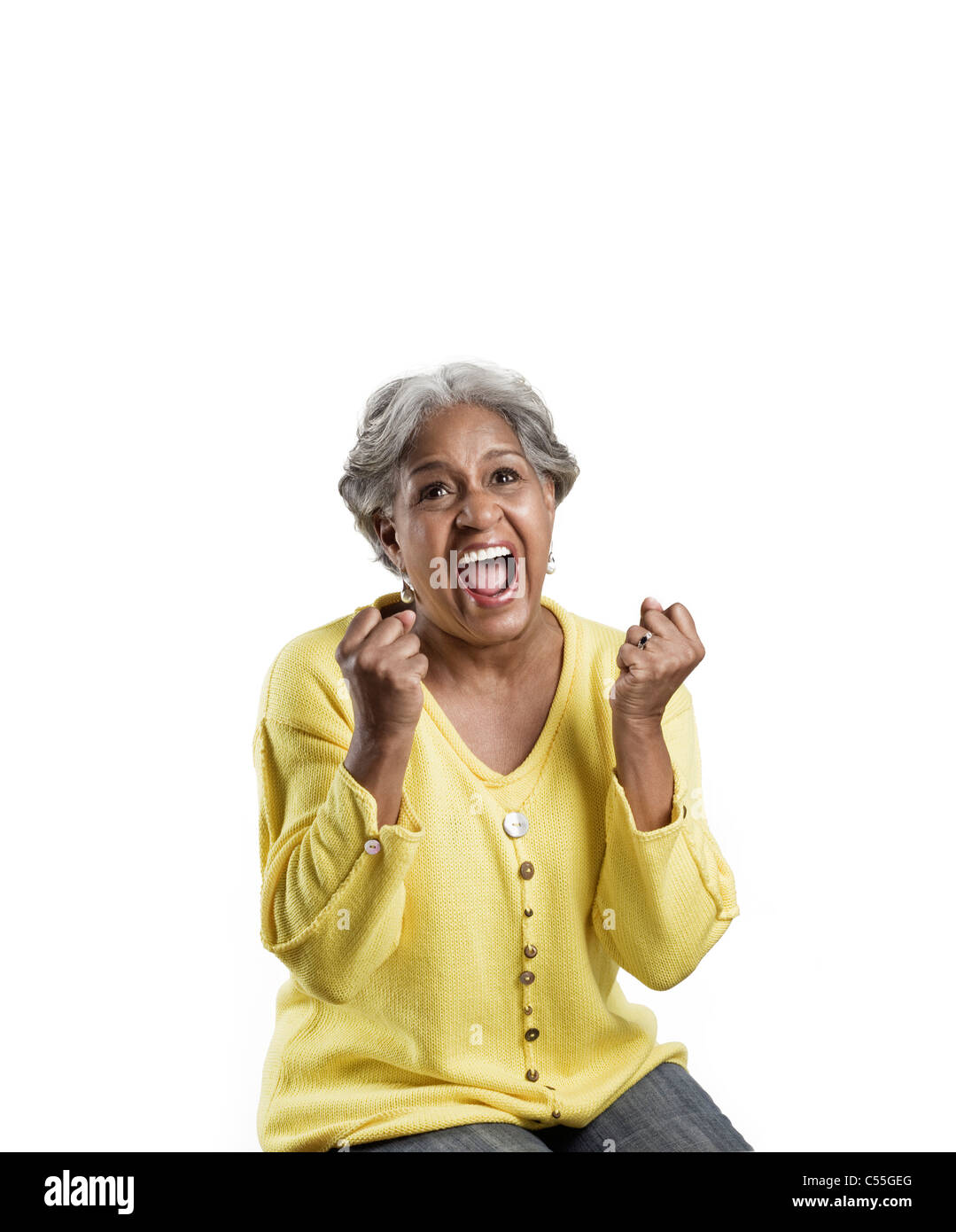 Senior woman looking excited Stock Photo - Alamy