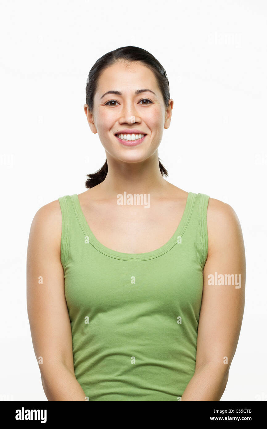 Portrait of a young woman smiling Stock Photo - Alamy