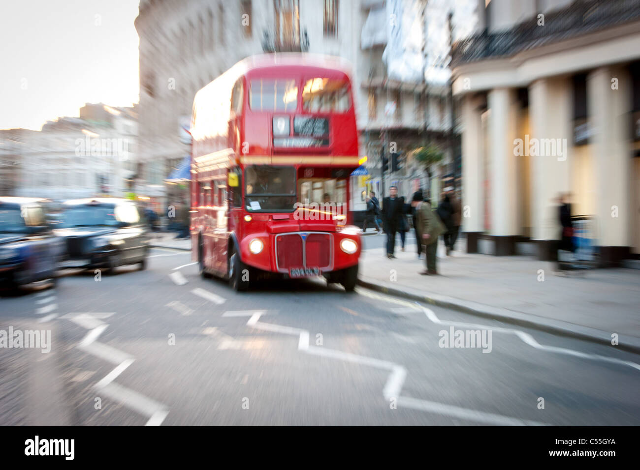 double decker red bus on road Stock Photo - Alamy