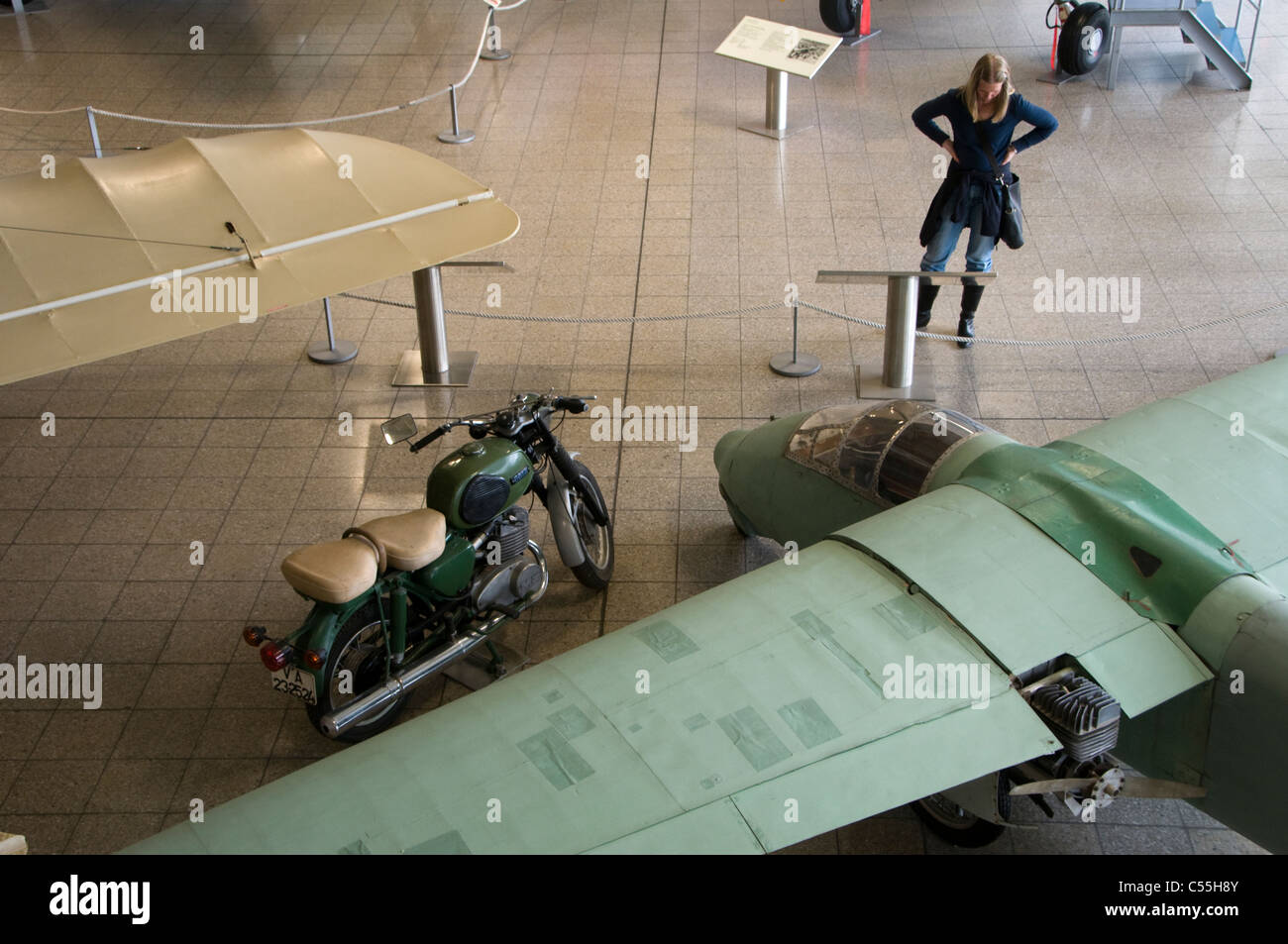 A visitor at the Flight hall room inside the Deutsches Museum in the ...