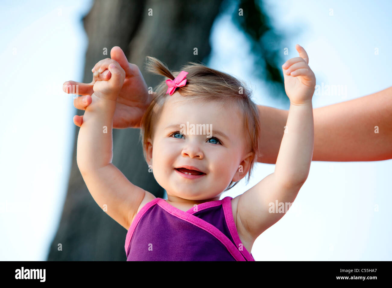 Cute baby playing mothers hands hi-res stock photography and images - Alamy
