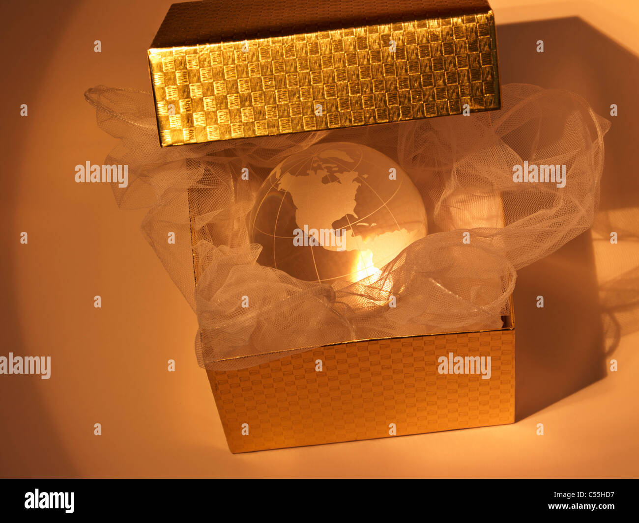 Globe in a box Stock Photo - Alamy