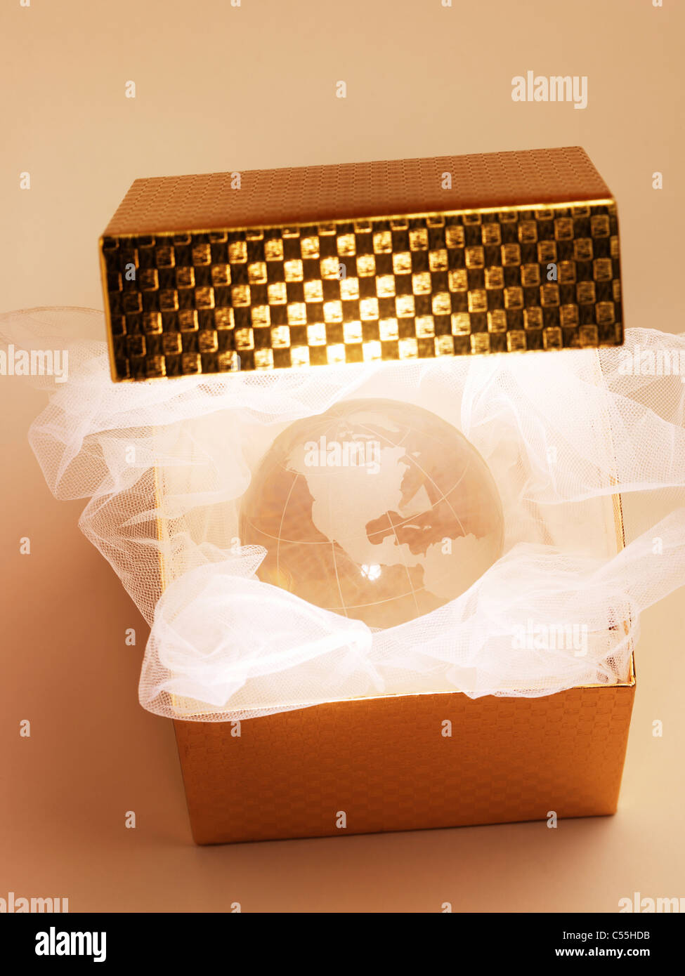 Globe in a box Stock Photo - Alamy