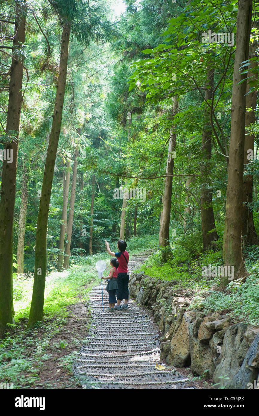mom and daughter in path Stock Photo - Alamy