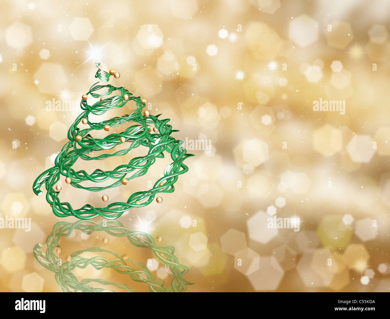 Twisted Christmas tree on golden background blurred lights Stock Photo ...