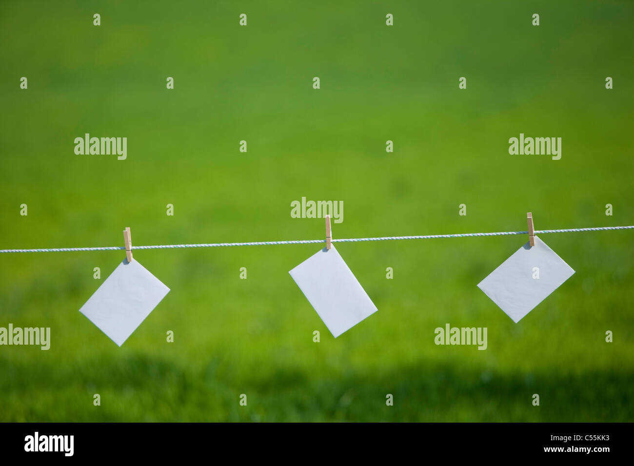 paper hanging in a string Stock Photo - Alamy