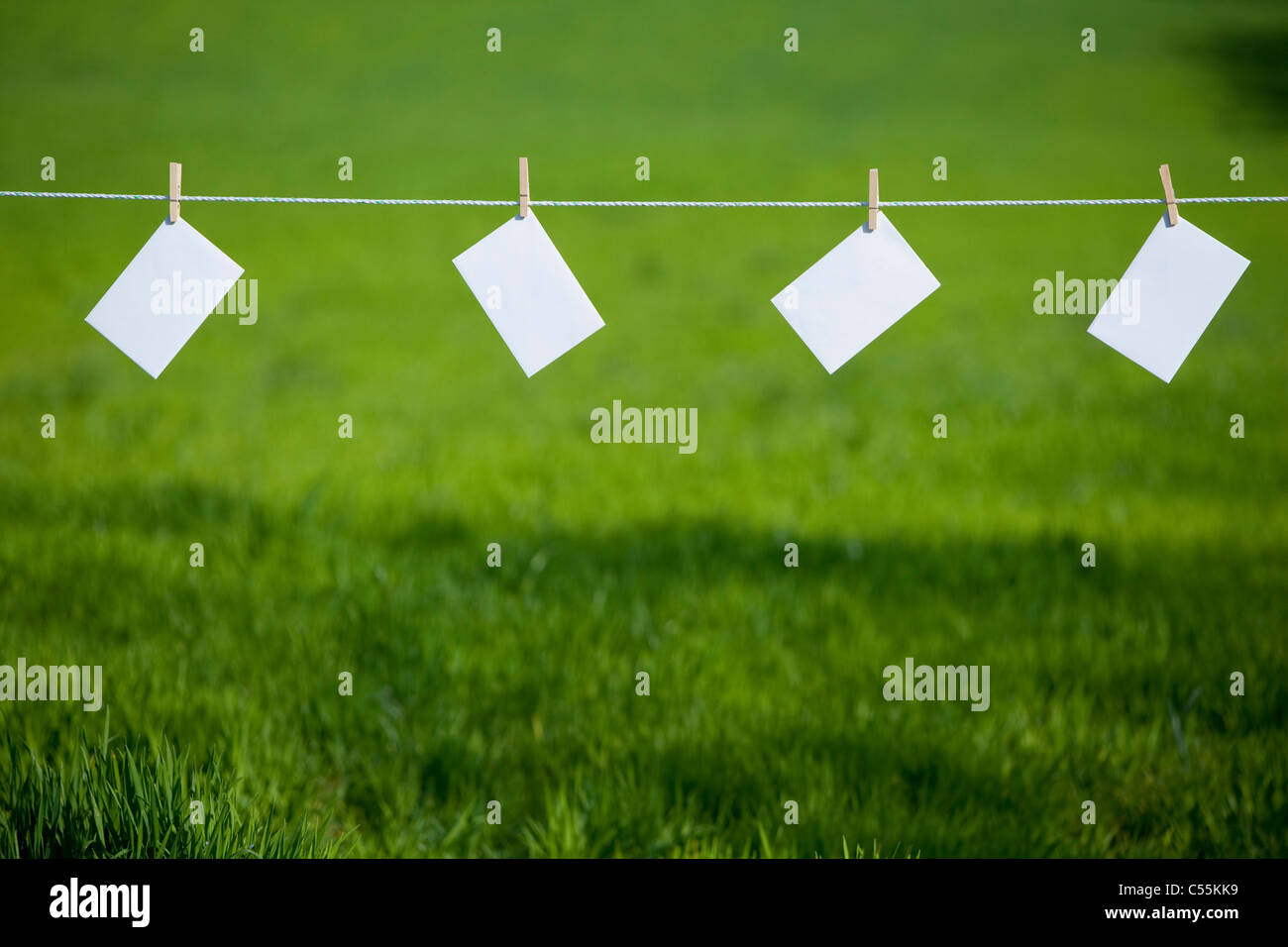 paper hanging in a string Stock Photo - Alamy