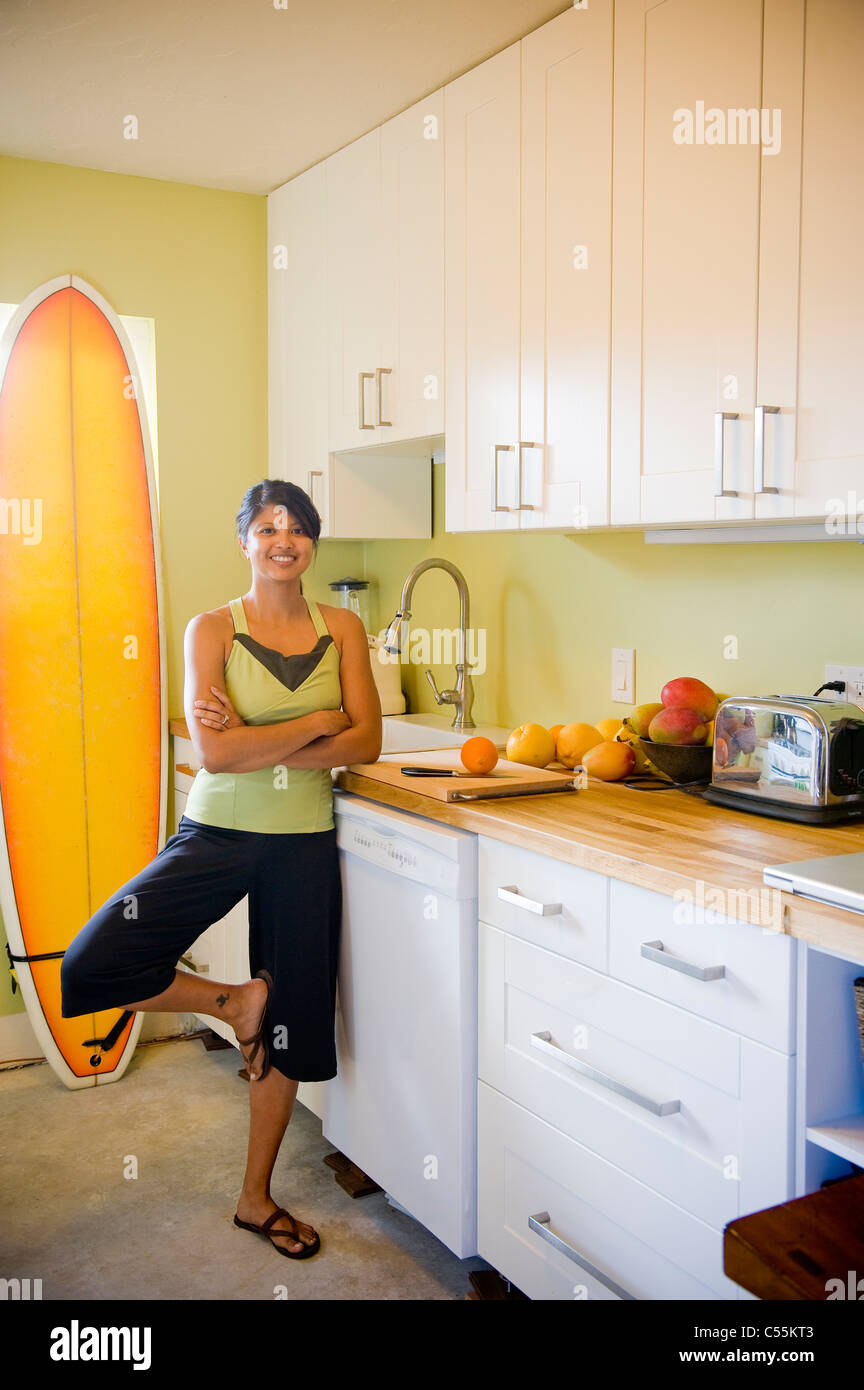 Woman exercising with food kitchen hi-res stock photography and images ...