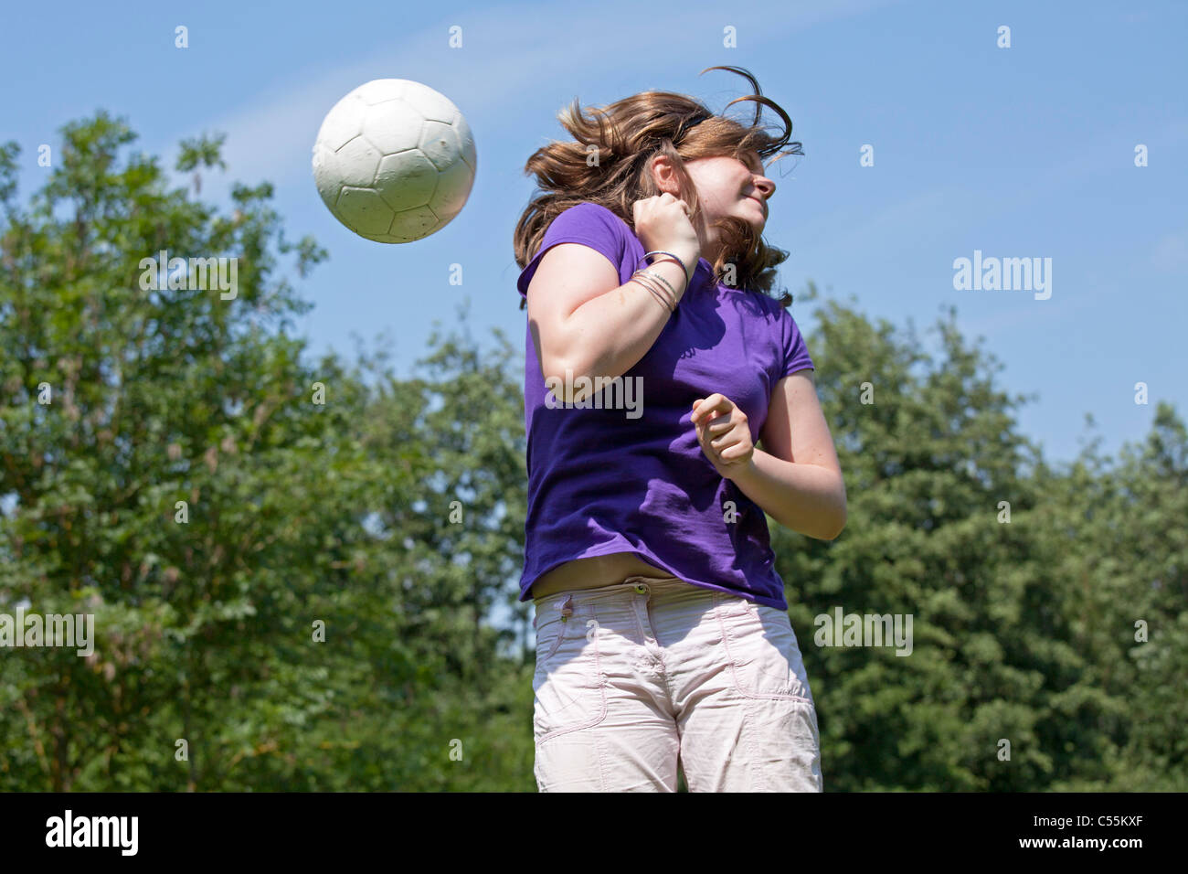 Football header hi-res stock photography and images - Alamy