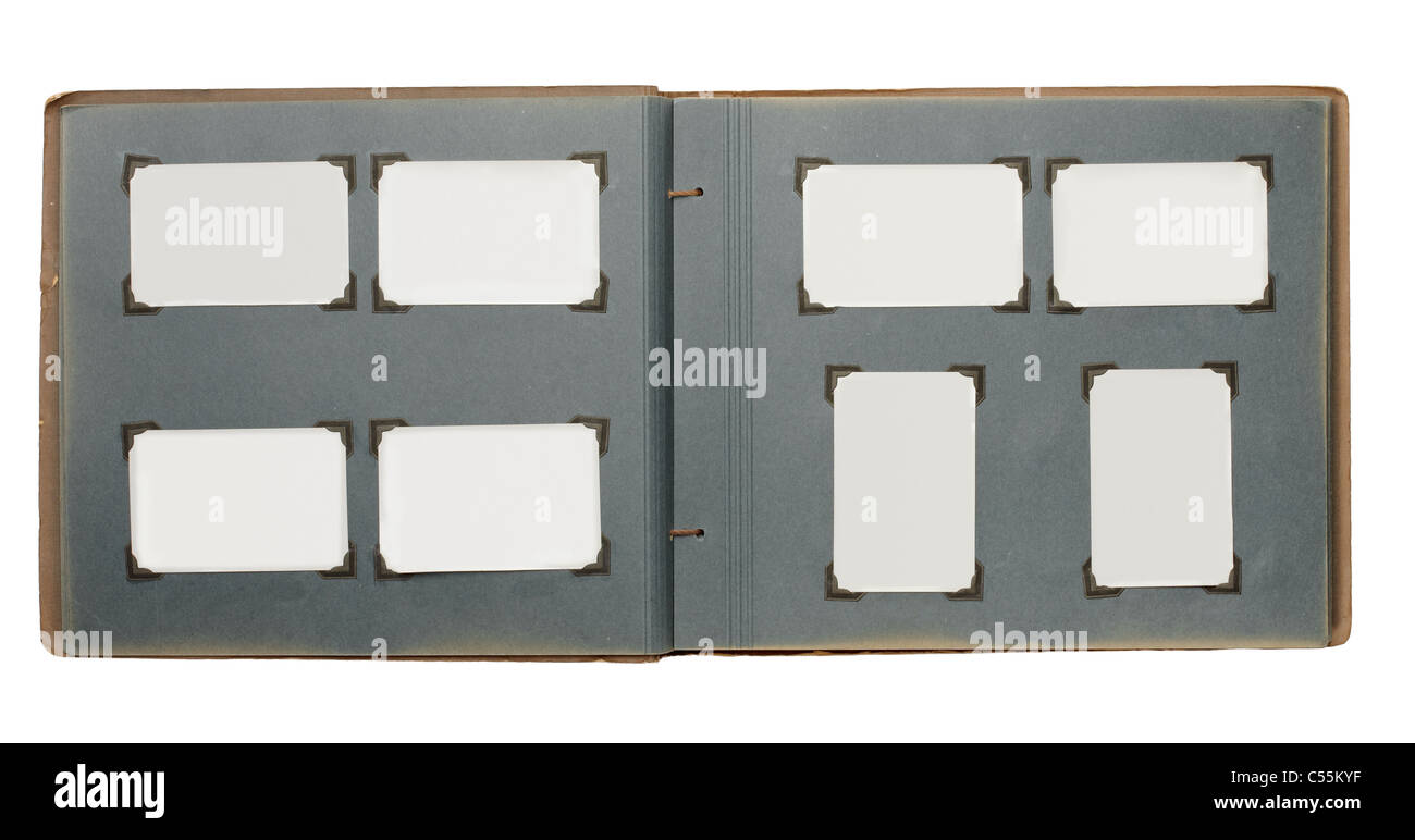 Vintage photo album with blank photos Stock Photo - Alamy