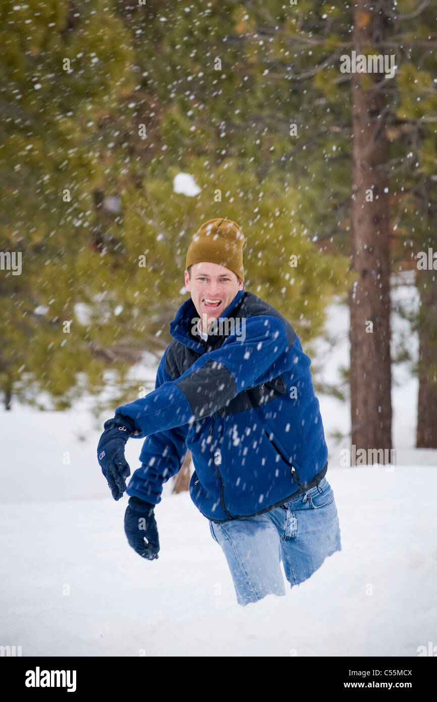 Person throwing snowballs hi-res stock photography and images - Alamy