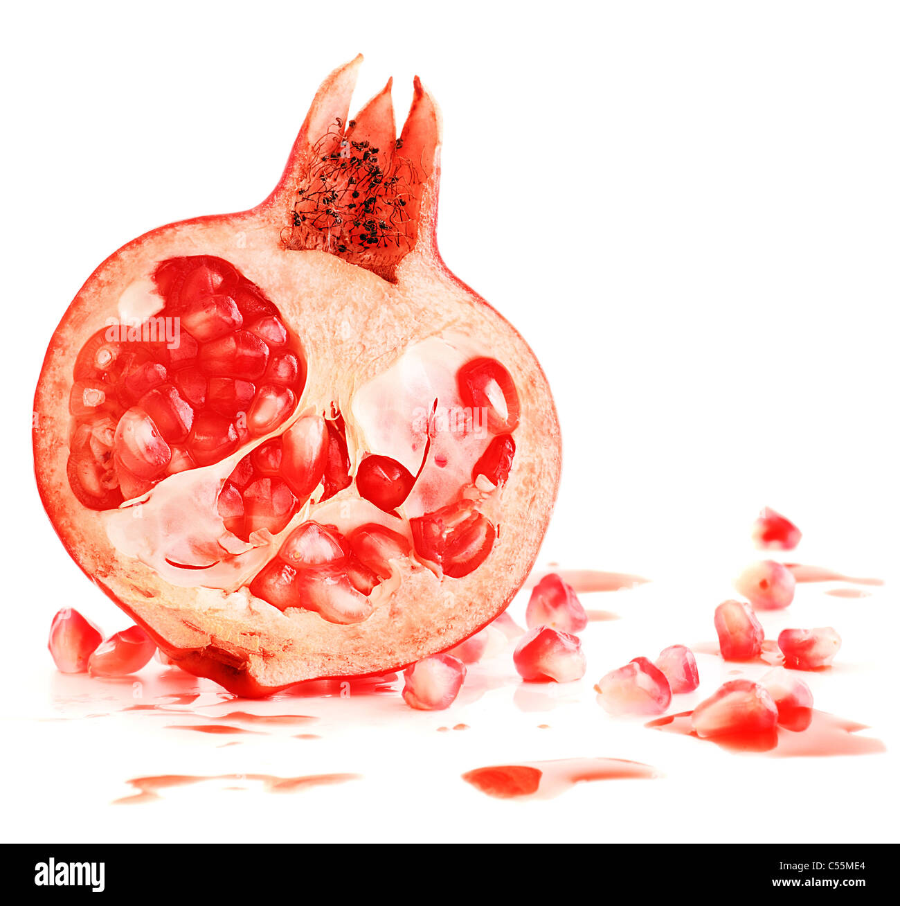 Ripe pomegranate fruit with half isolated on white background Stock ...