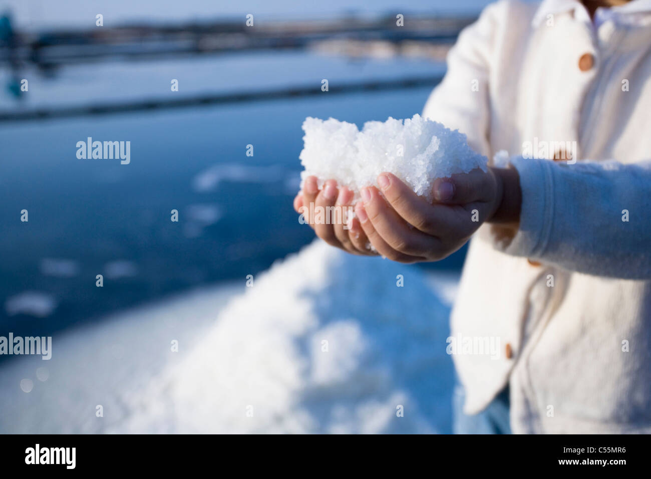 handful of salt Stock Photo - Alamy