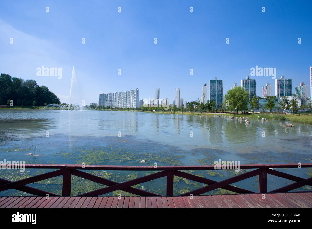 a bridge on river side in town Stock Photo - Alamy
