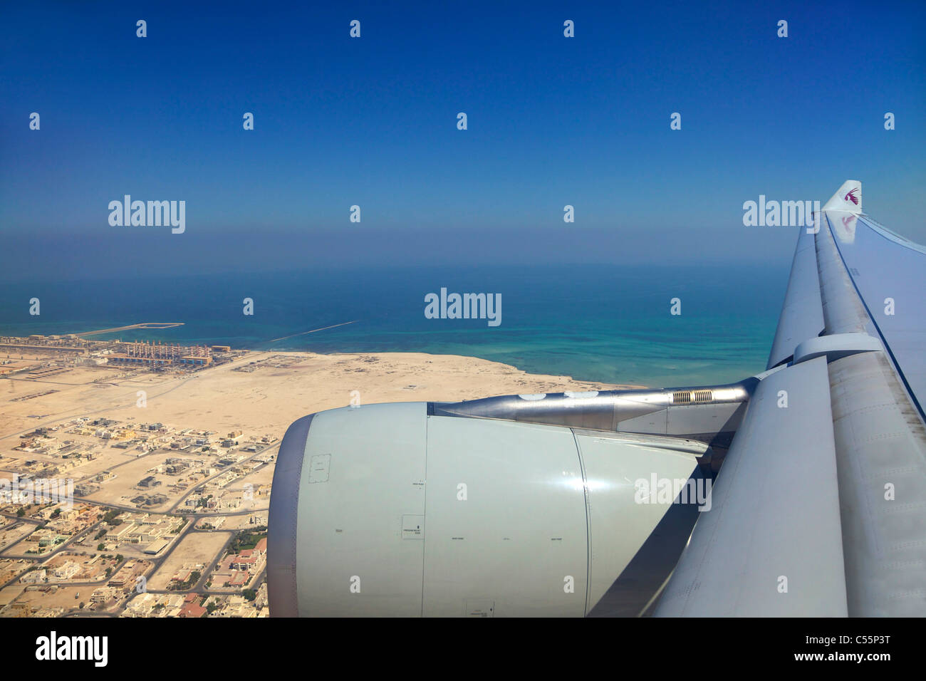 Airport viewed through from a airplane, Doha International Airport ...