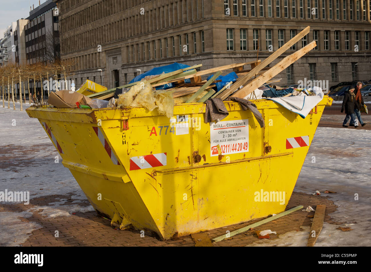 Skip full of rubbish Stock Photo - Alamy
