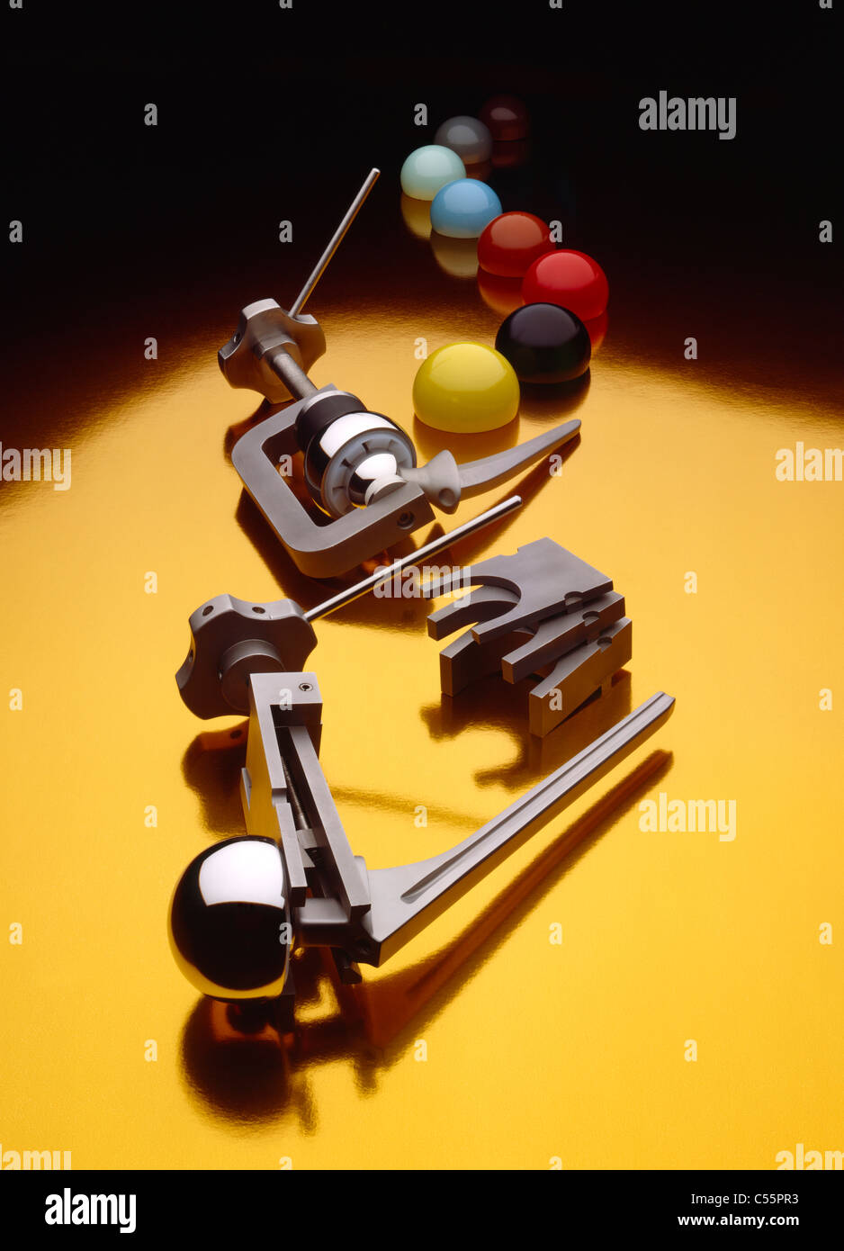 Orthopedic hip replacement system on yellow background, studio shot ...