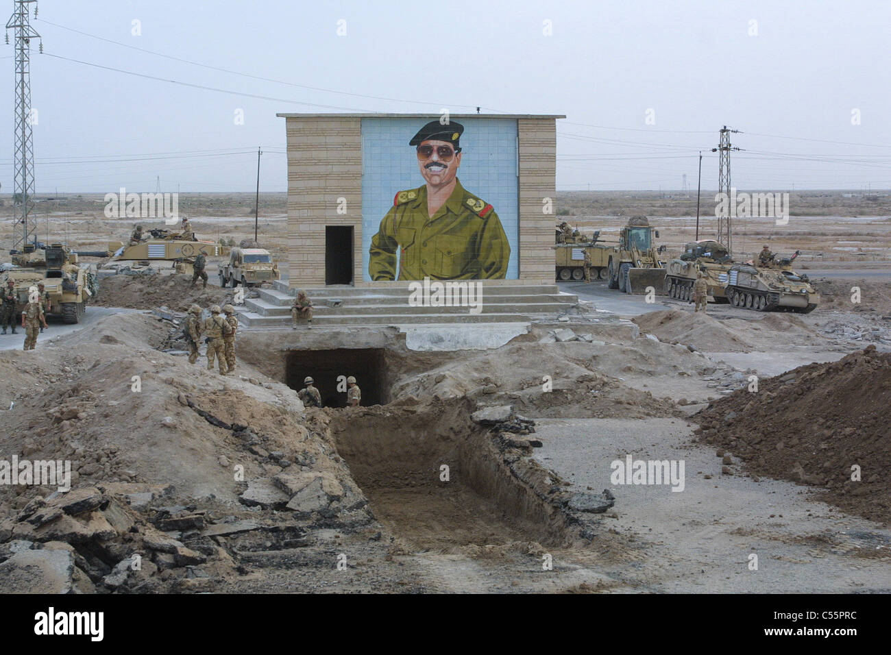 DESERT RATS SURROUND A MONUMENT TO SADDAM HUSSAIN IN SOUTHERN IRAQ-2003 ...