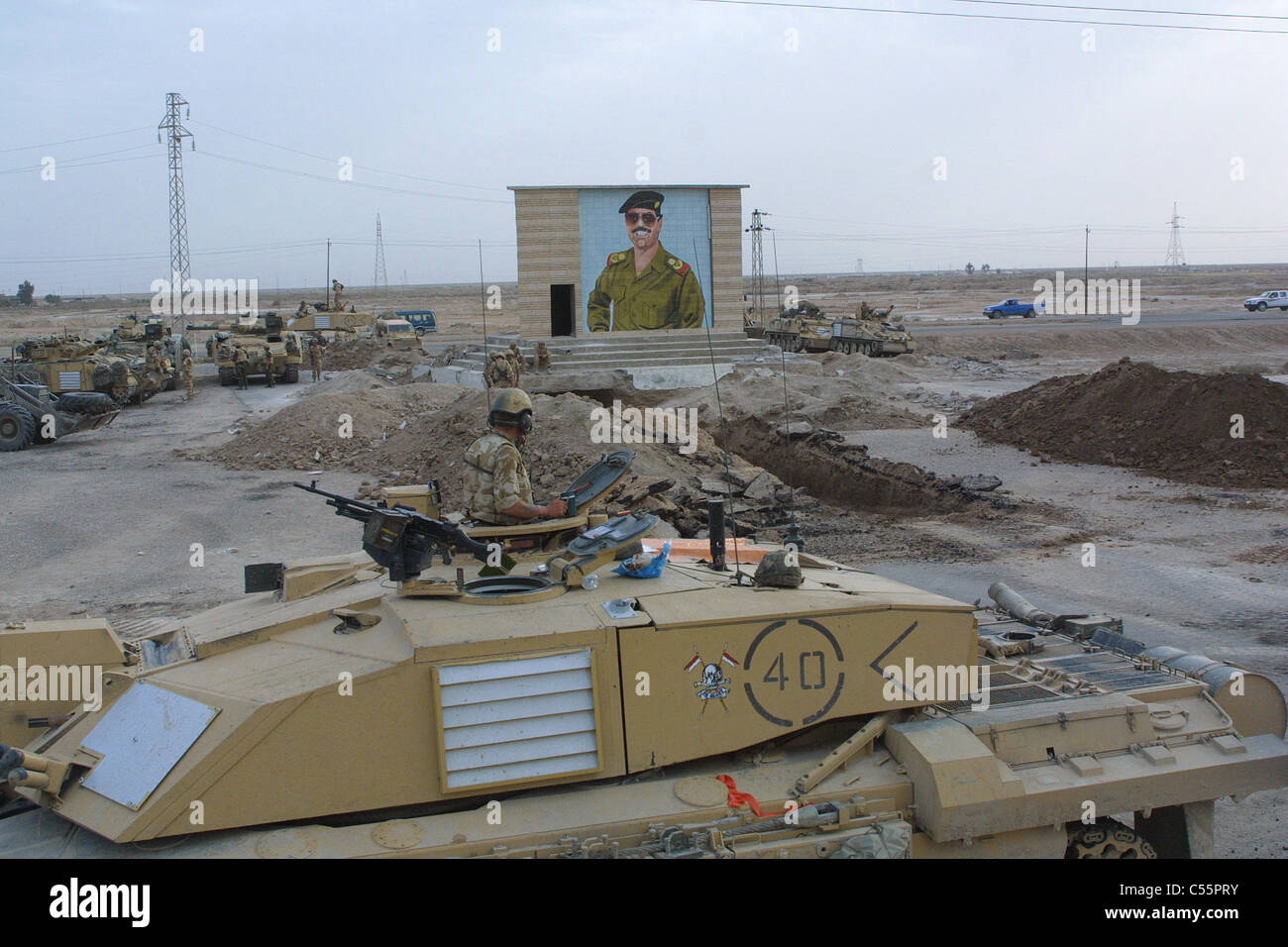 DESERT RATS SURROUND A MONUMENT TO SADDAM HUSSAIN IN SOUTHERN IRAQ-2003 ...