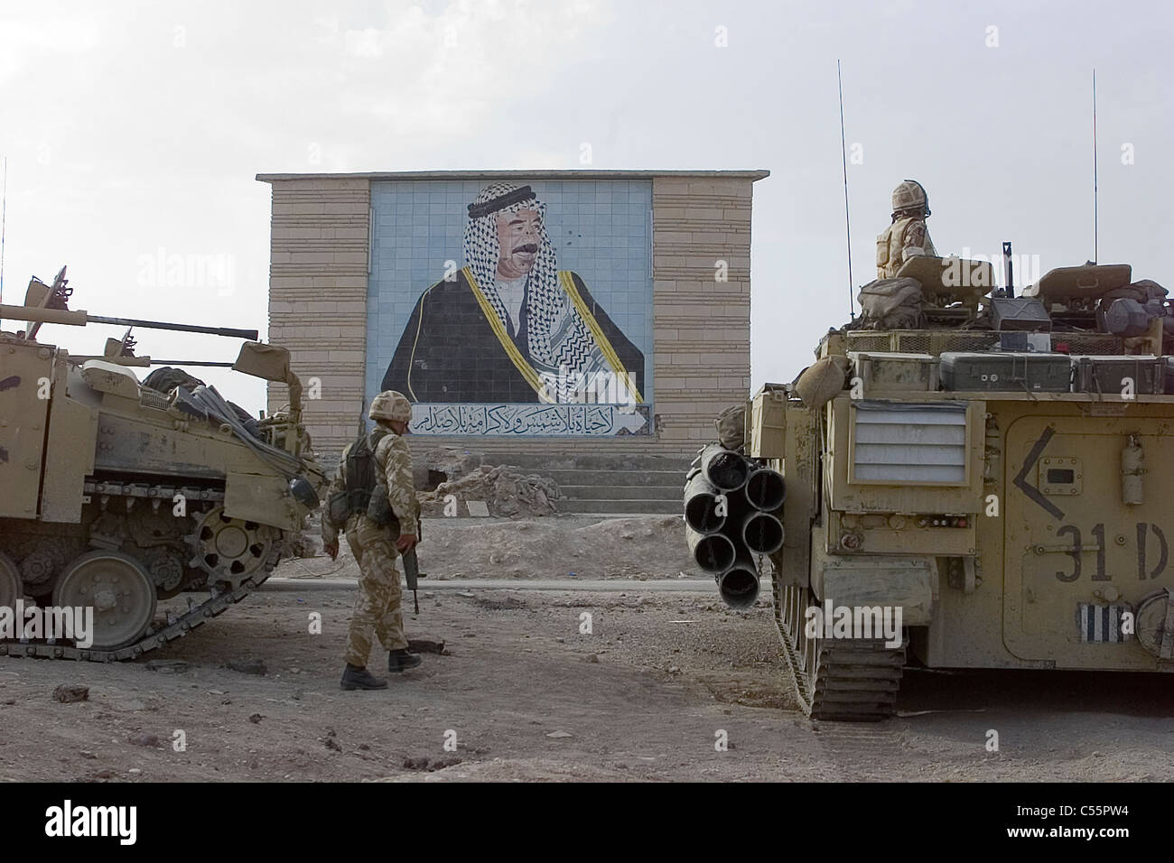 DESERT RATS SURROUND A MONUMENT TO SADDAM HUSSAIN IN SOUTHERN IRAQ-2003 ...