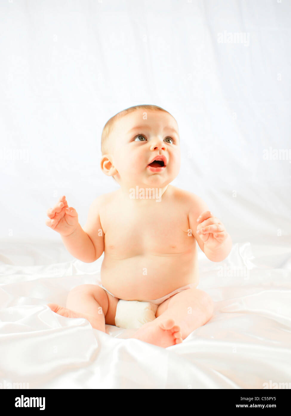 Baby boy in nappy Stock Photo - Alamy