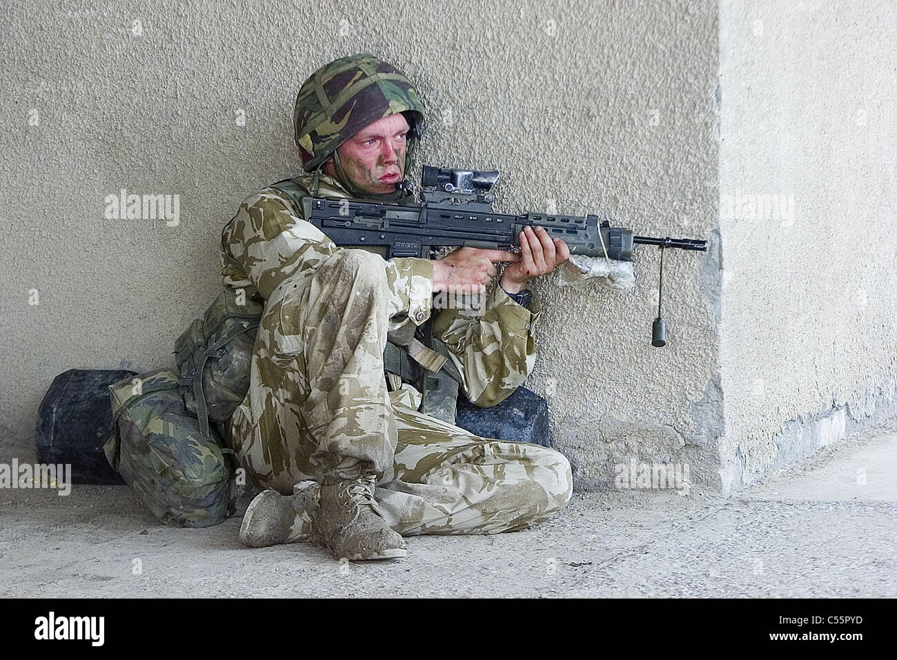 THE DESERT RATS PREPARE TO ENTER THE IRAQI CITY OF BASRA. ONE MAN ...