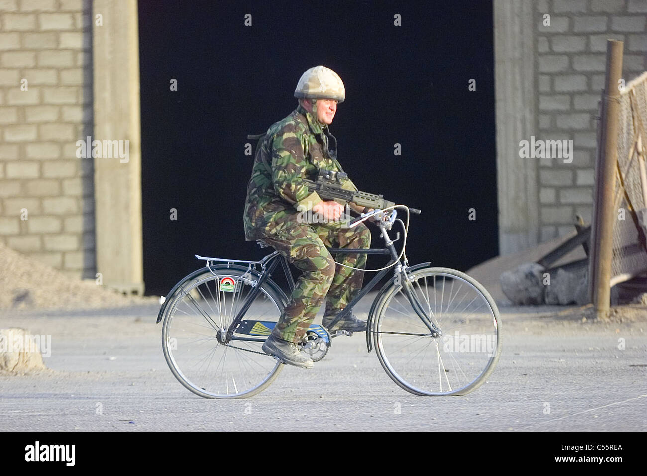 British soldier on a bike in Basra, Southern Iraq Stock Photo - Alamy