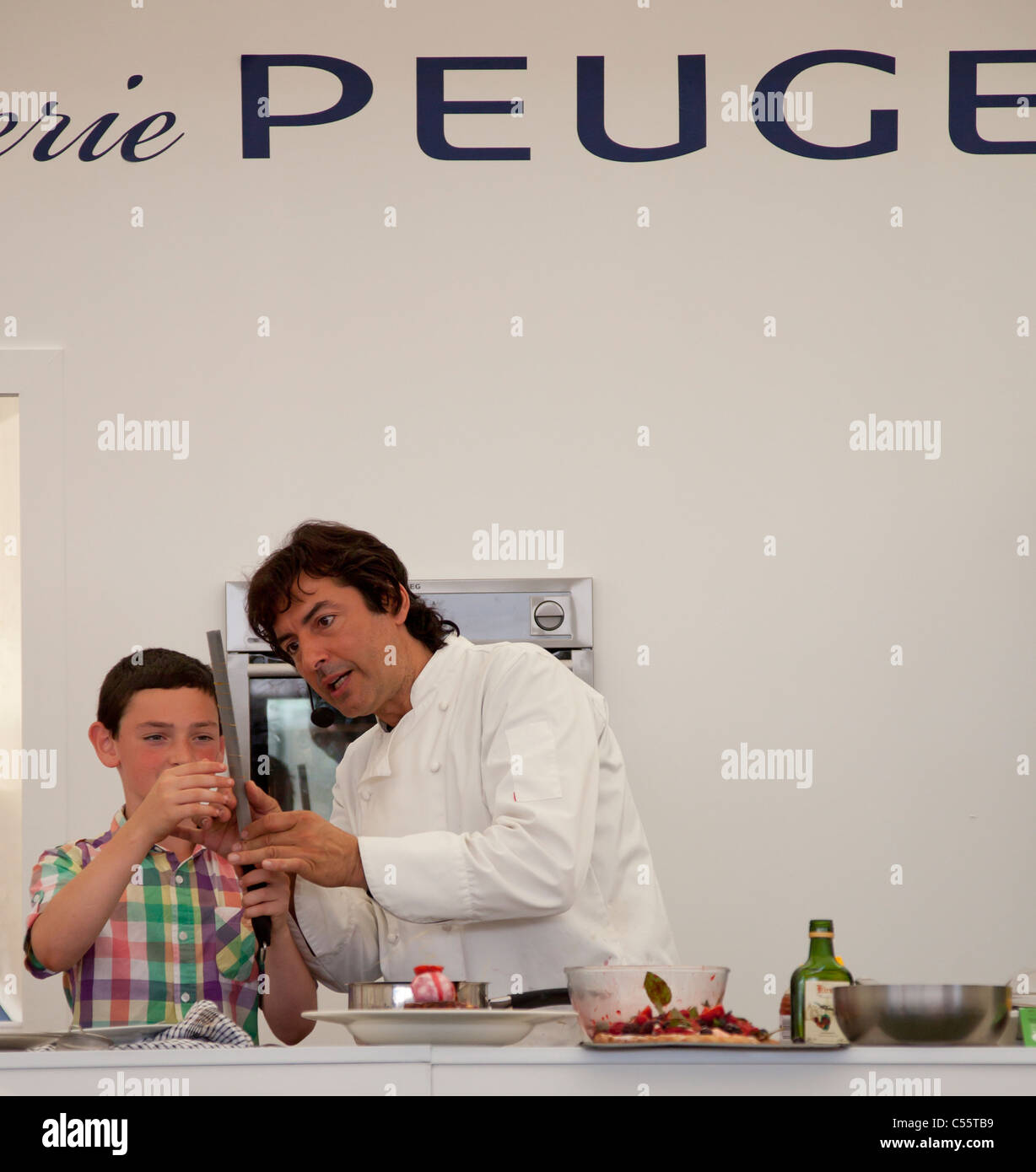 French celebrity chef Jean Christophe Novelli with a boy from the ...