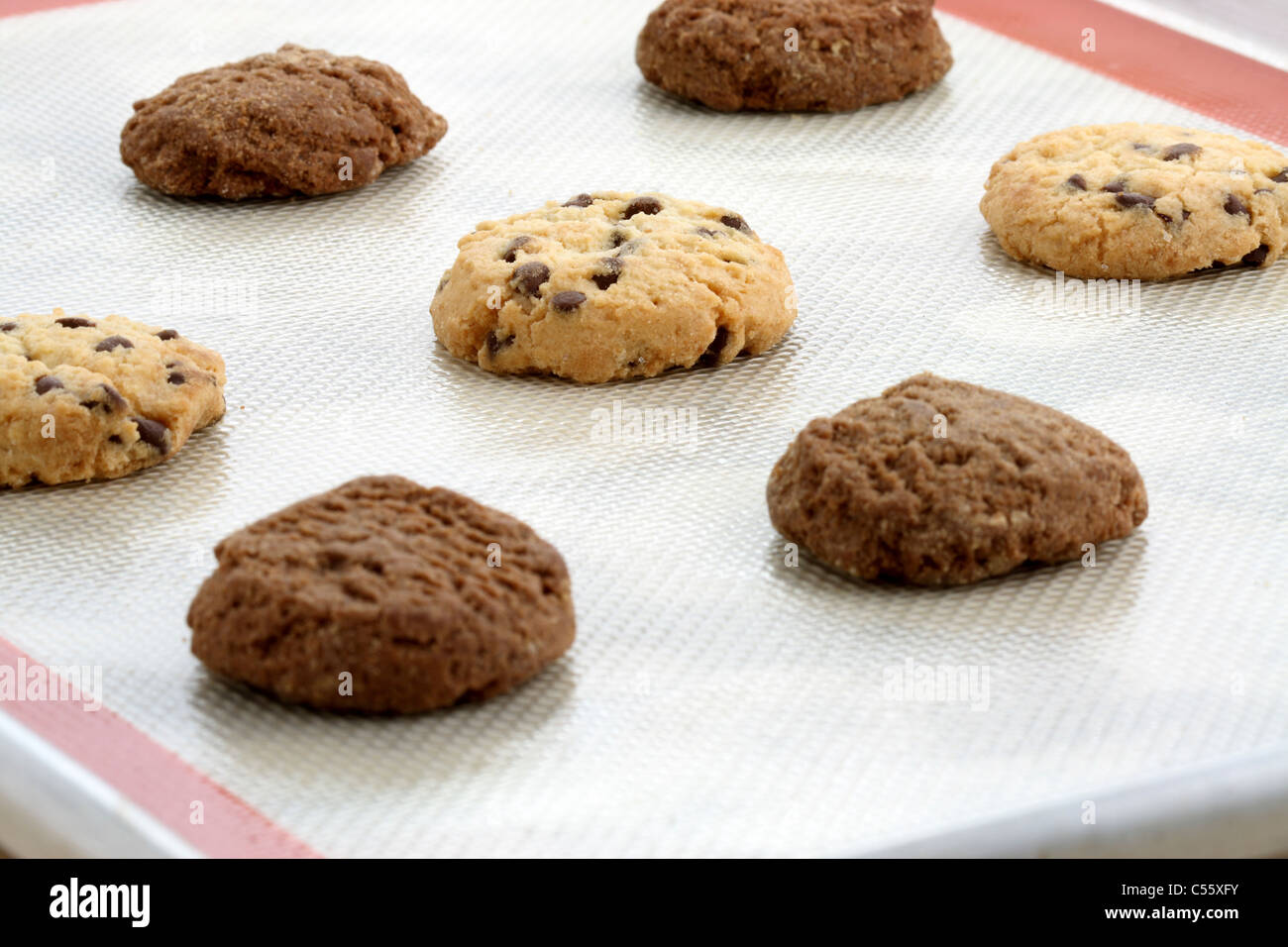 Fresh baked Stack of warm chocolate chips cookies and chocolate cookies ...