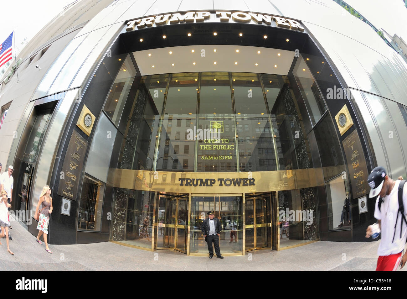 Trump Tower entrance seen from sidewalk, with doorman, pedestrians ...