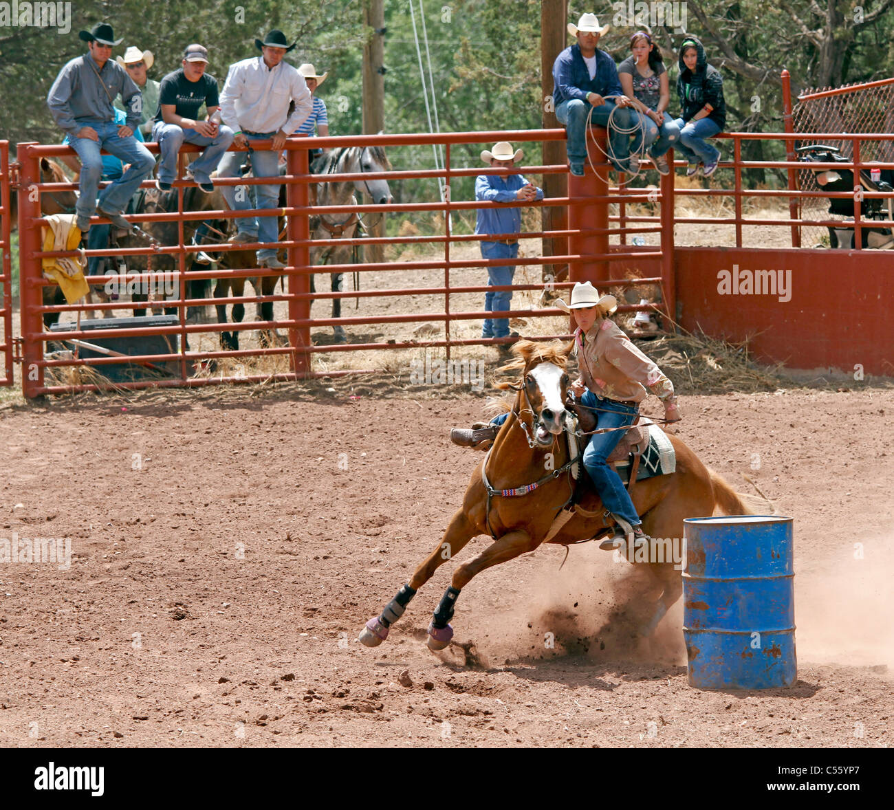 Woman competing in the barrel racing event at the Annual Indian Rodeo ...