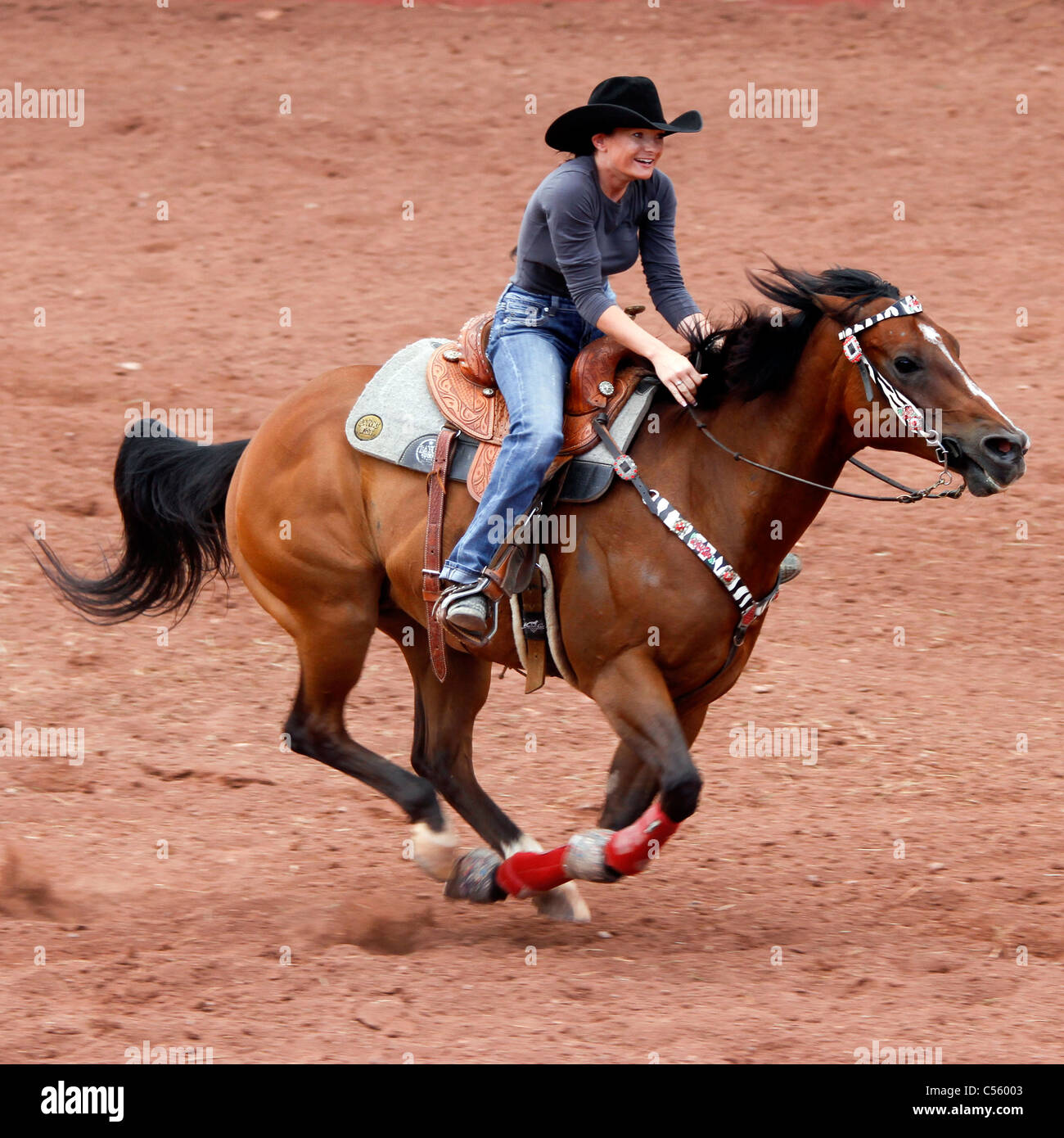Woman competing in the barrel racing event at the Annual Indian Rodeo ...