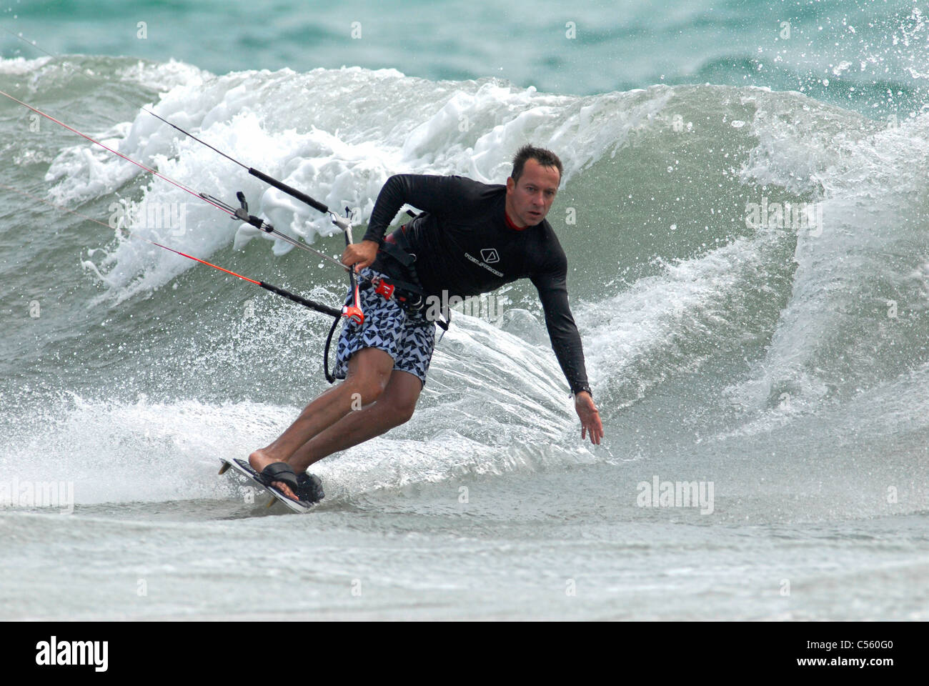 Kite surfer in wave hi-res stock photography and images - Alamy