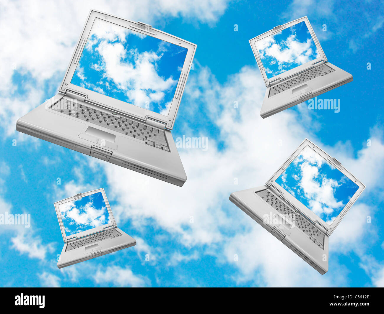 Laptops falling from a blue sky Stock Photo - Alamy